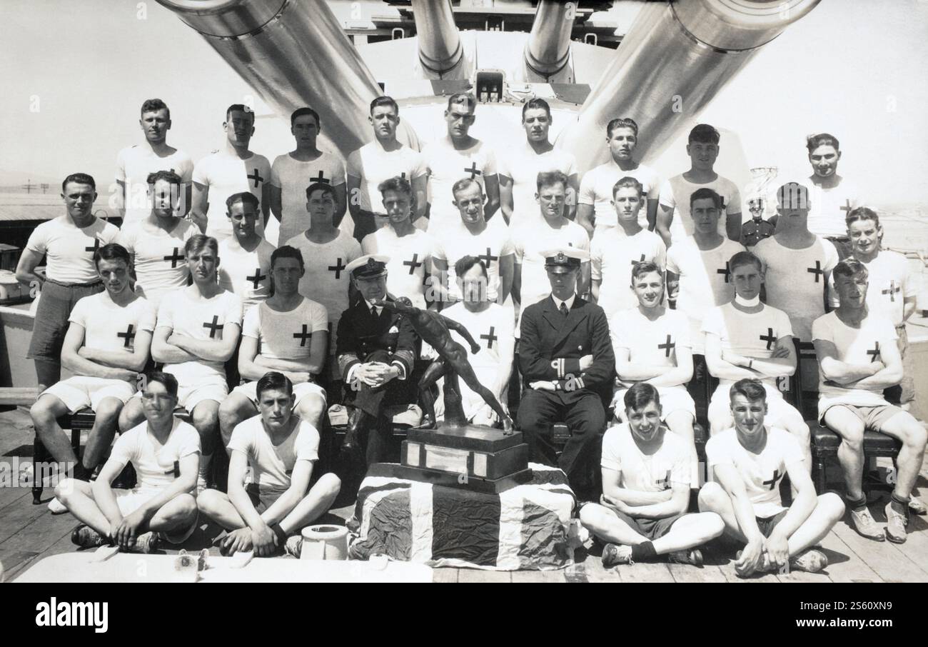 Royal Navy sailors on the deck of a battleship with the Arbuthnot ...