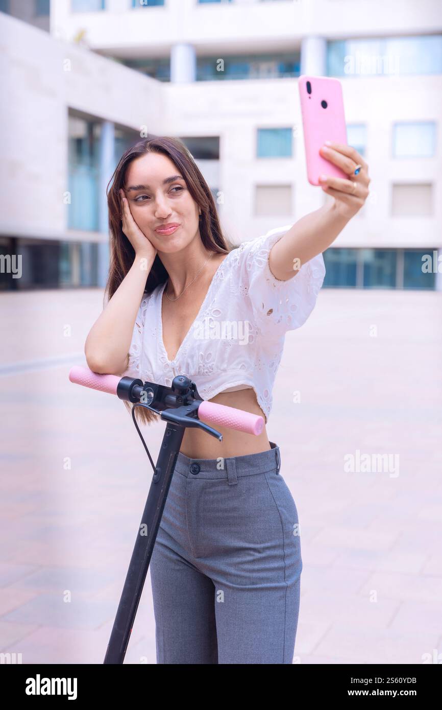 Young woman taking selfie phone hi-res stock photography and images - Alamy