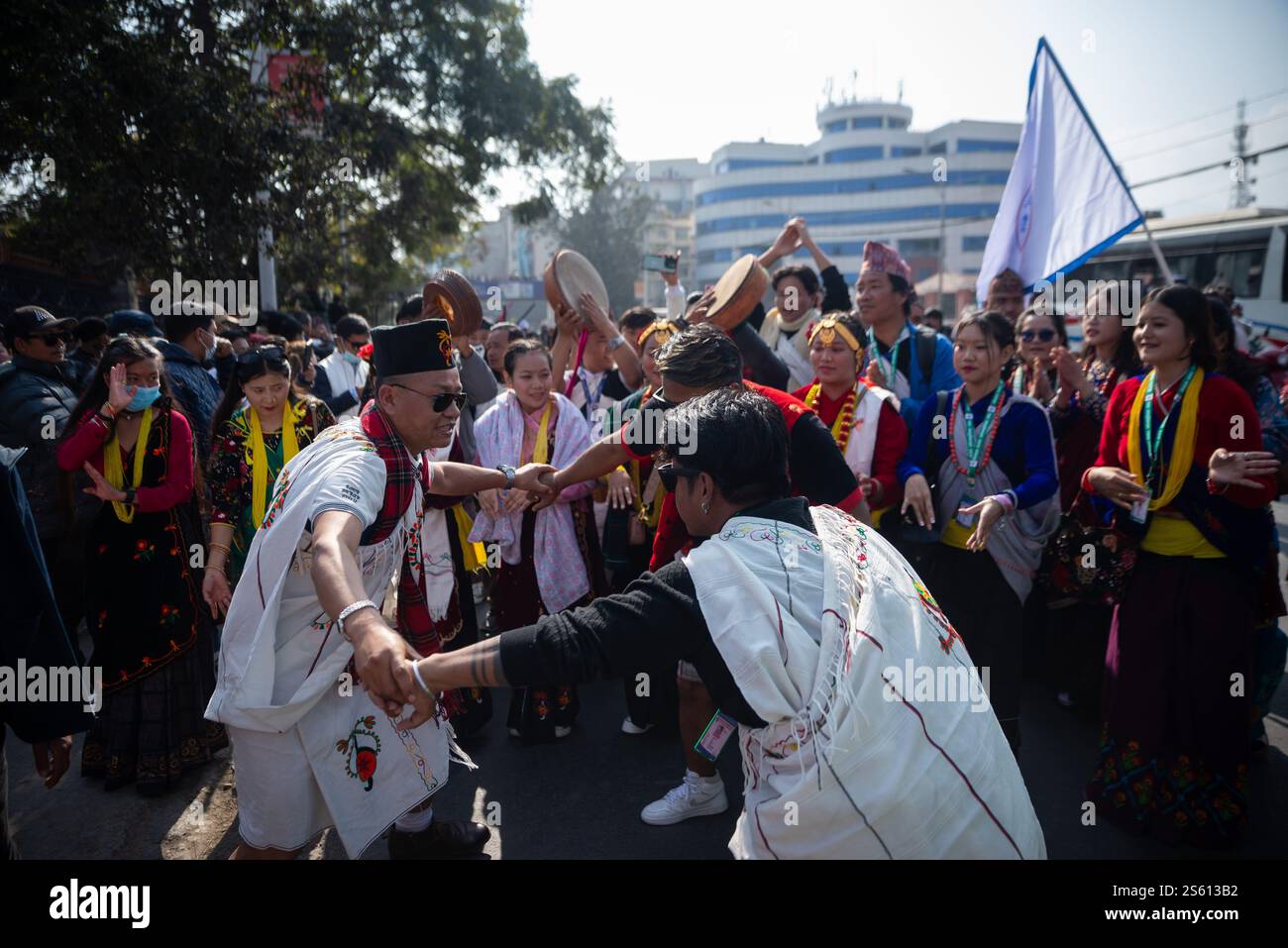 People from Magar community dressed in traditional attires sing and ...