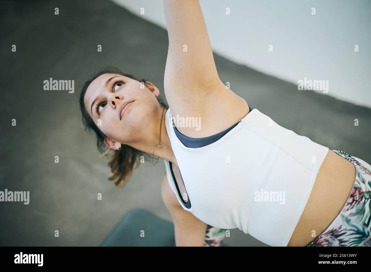 Yoga, woman and triangle exercise for workout, training and fitness of ...
