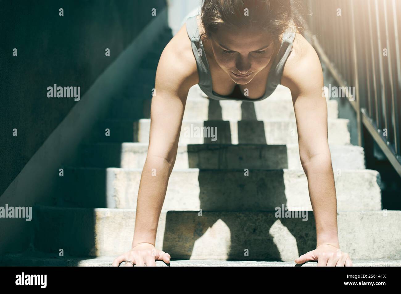 Pushups, stairs and fitness woman in arm exercise, workout and sports ...