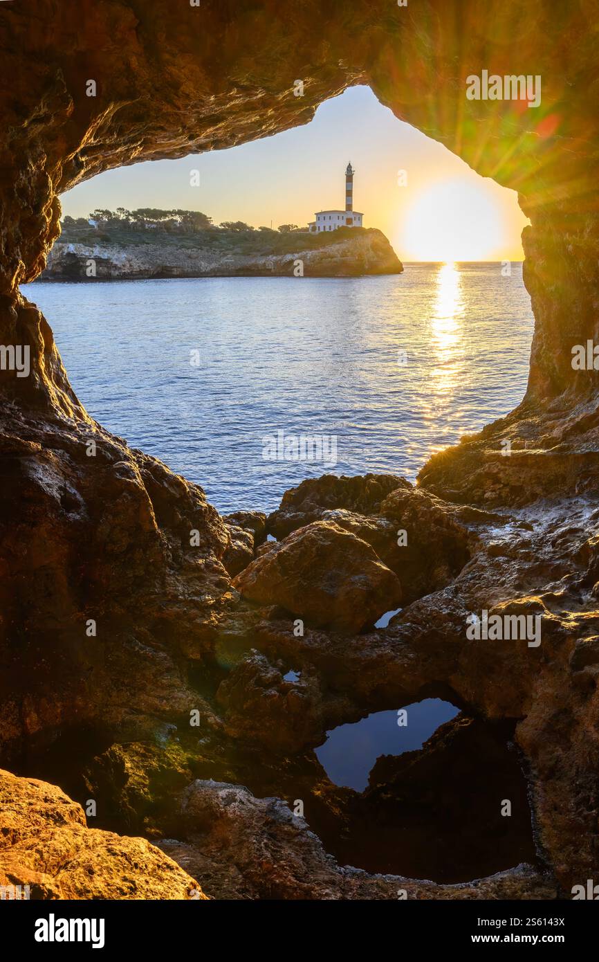 The Portocolom lighthouse on the island of Majorca can be seen through ...