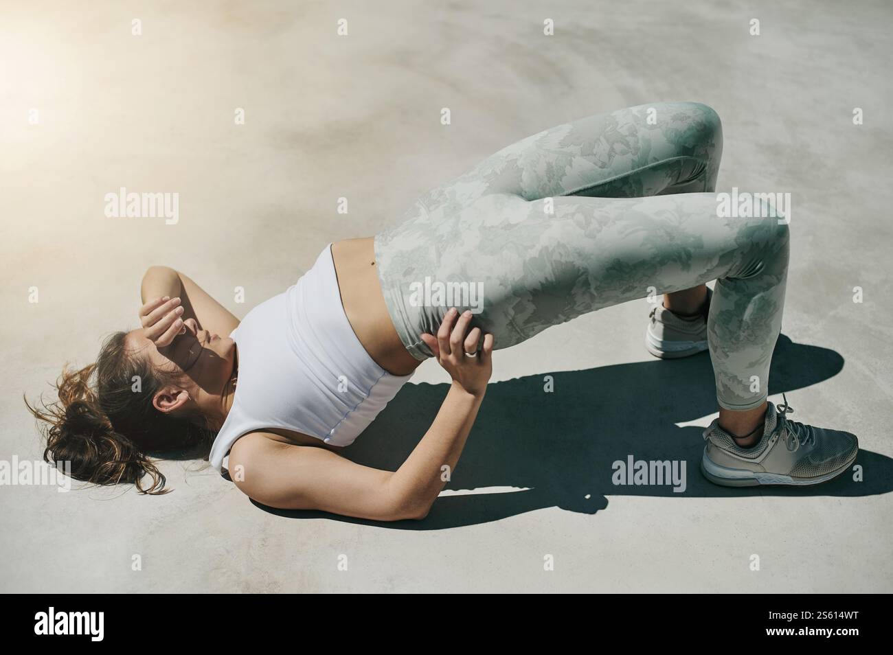 Top view, woman and fitness with exercise, bridge and training for ...
