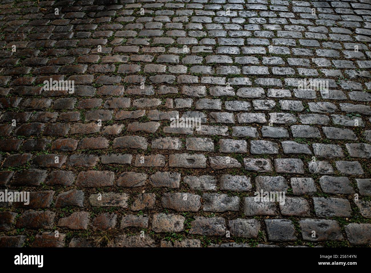 Pavement road. Background of bricks road. Stone cladding pavement ...