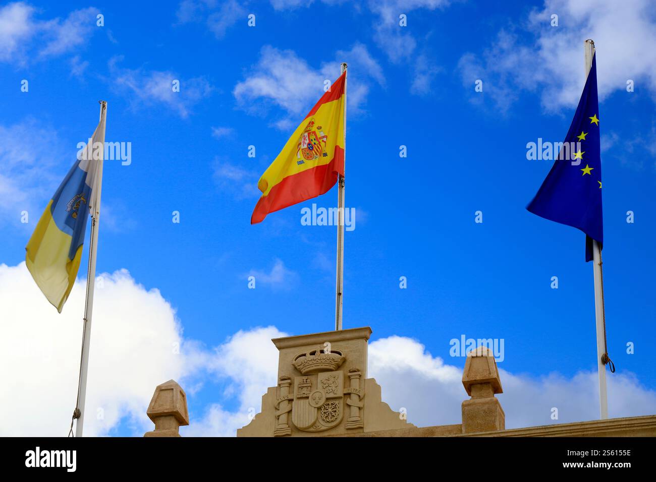 Flags of the Canary Islands, Spain and the EU, Ayuntamiento Puerto Del ...