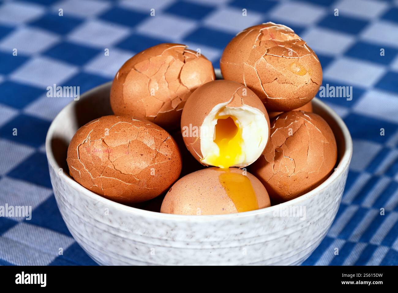 Soft boiled eggs in a white bowl hi-res stock photography and images ...