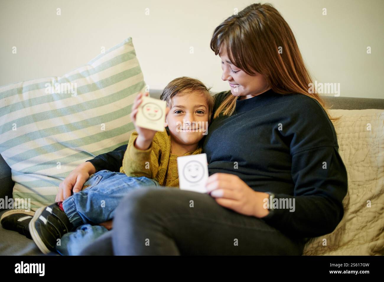 Flash cards, kid portrait and mother with education and emotional ...