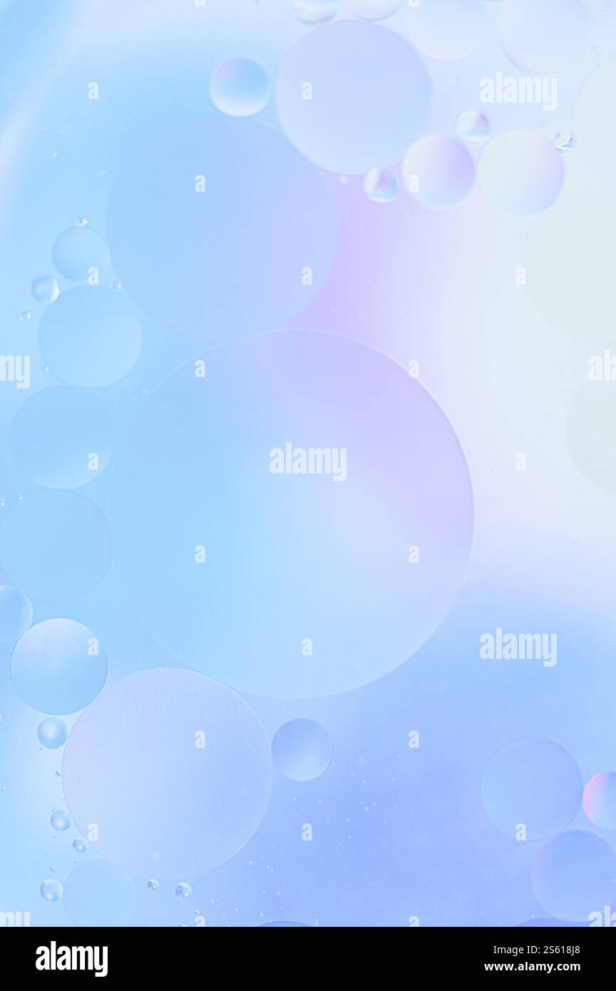 Delicate blue background with floating bubbles in pastel shades of blue ...