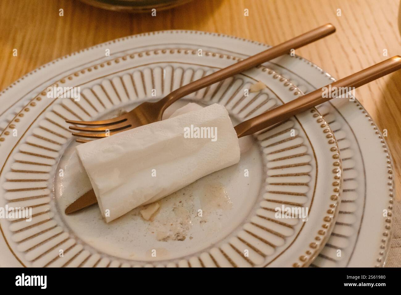 dirty plates on the table of a Georgian cafe. food-stained white plates ...