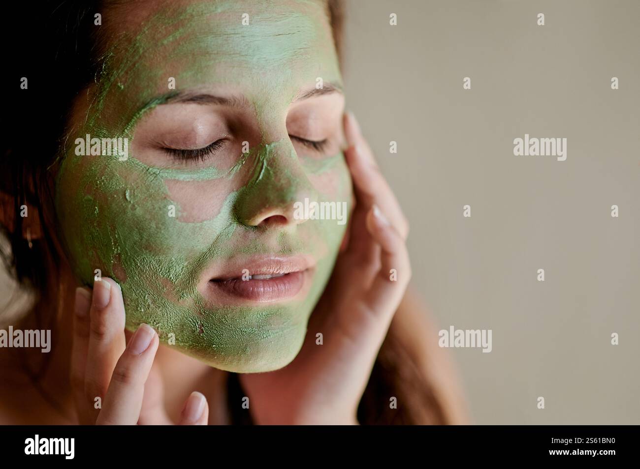 Facial, beauty and woman using cosmetic product on her face for ...