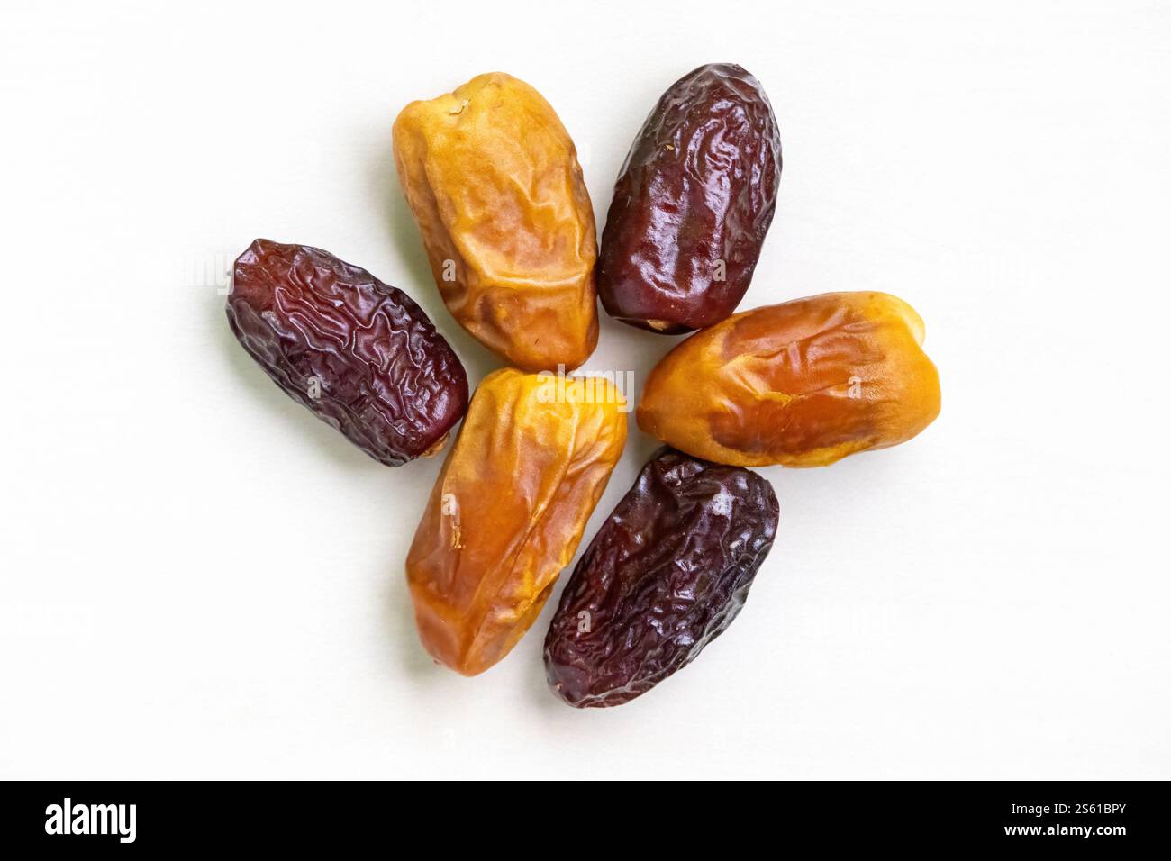 Two varieties of fresh, tasty, and delicious dried date palm fruits are ...
