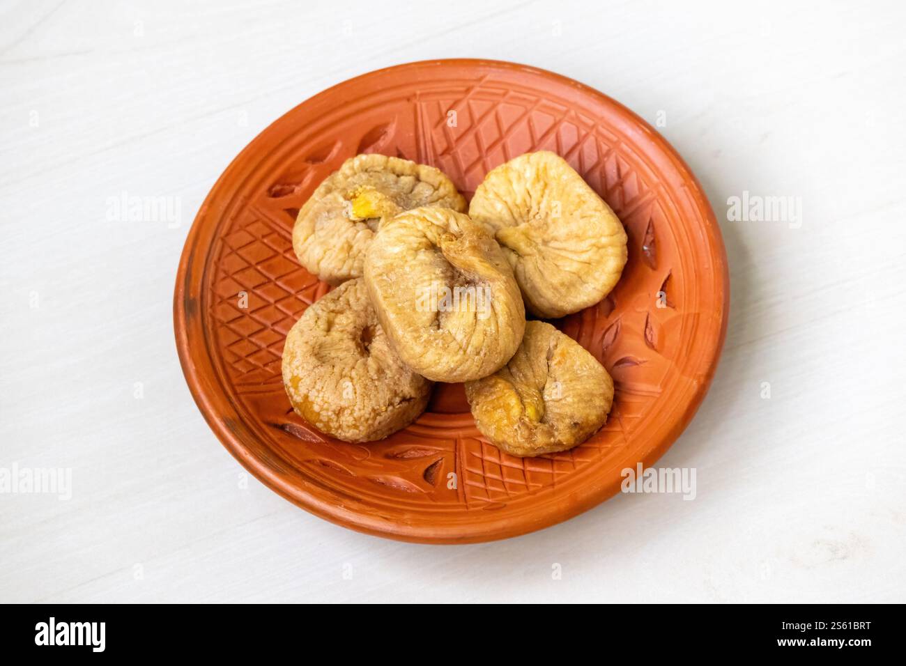 Dried figs (Ficus carica), locally known as dumur in Bangladesh, are ...