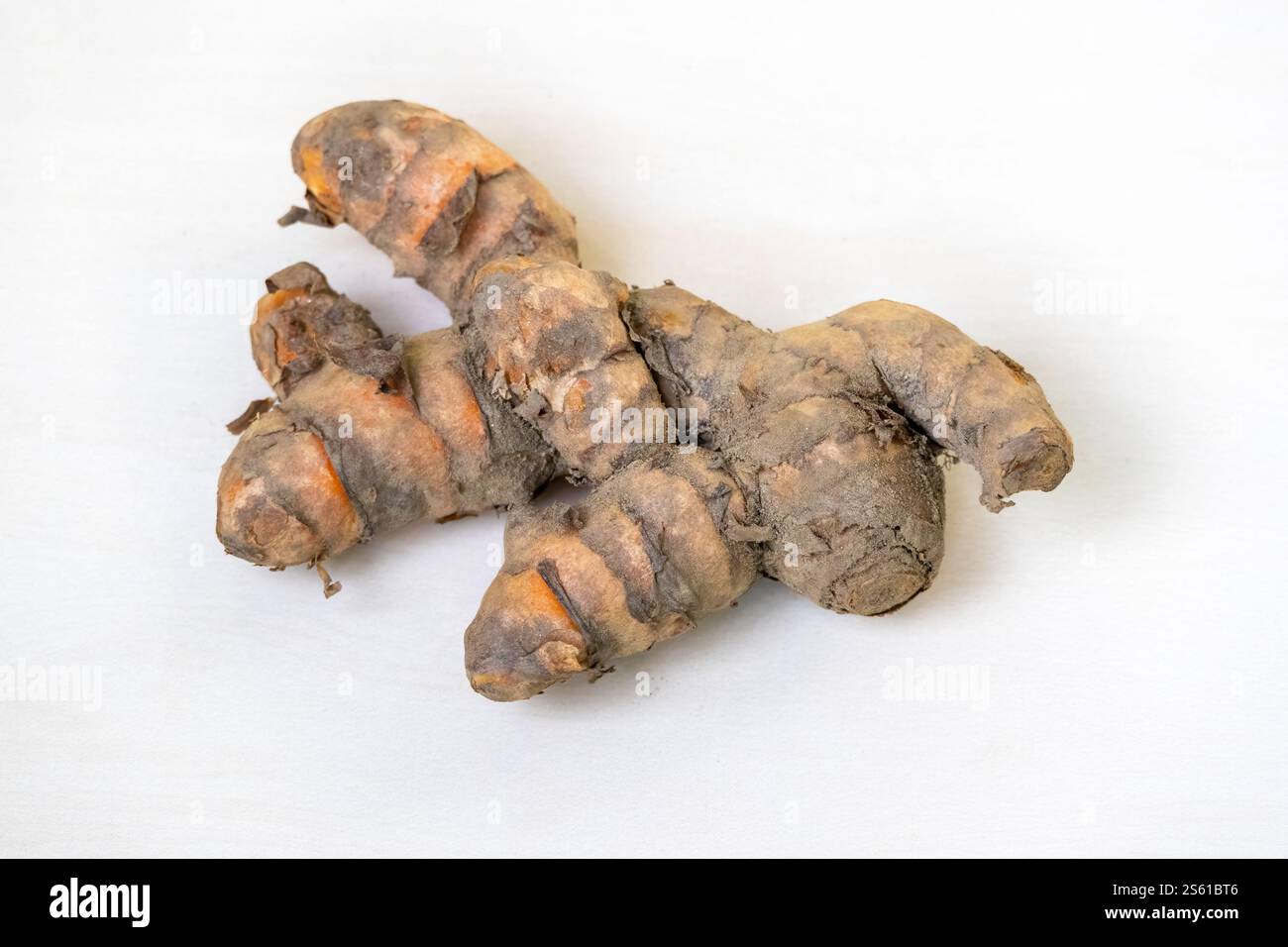 Fresh, raw turmeric root on a white background Stock Photo - Alamy