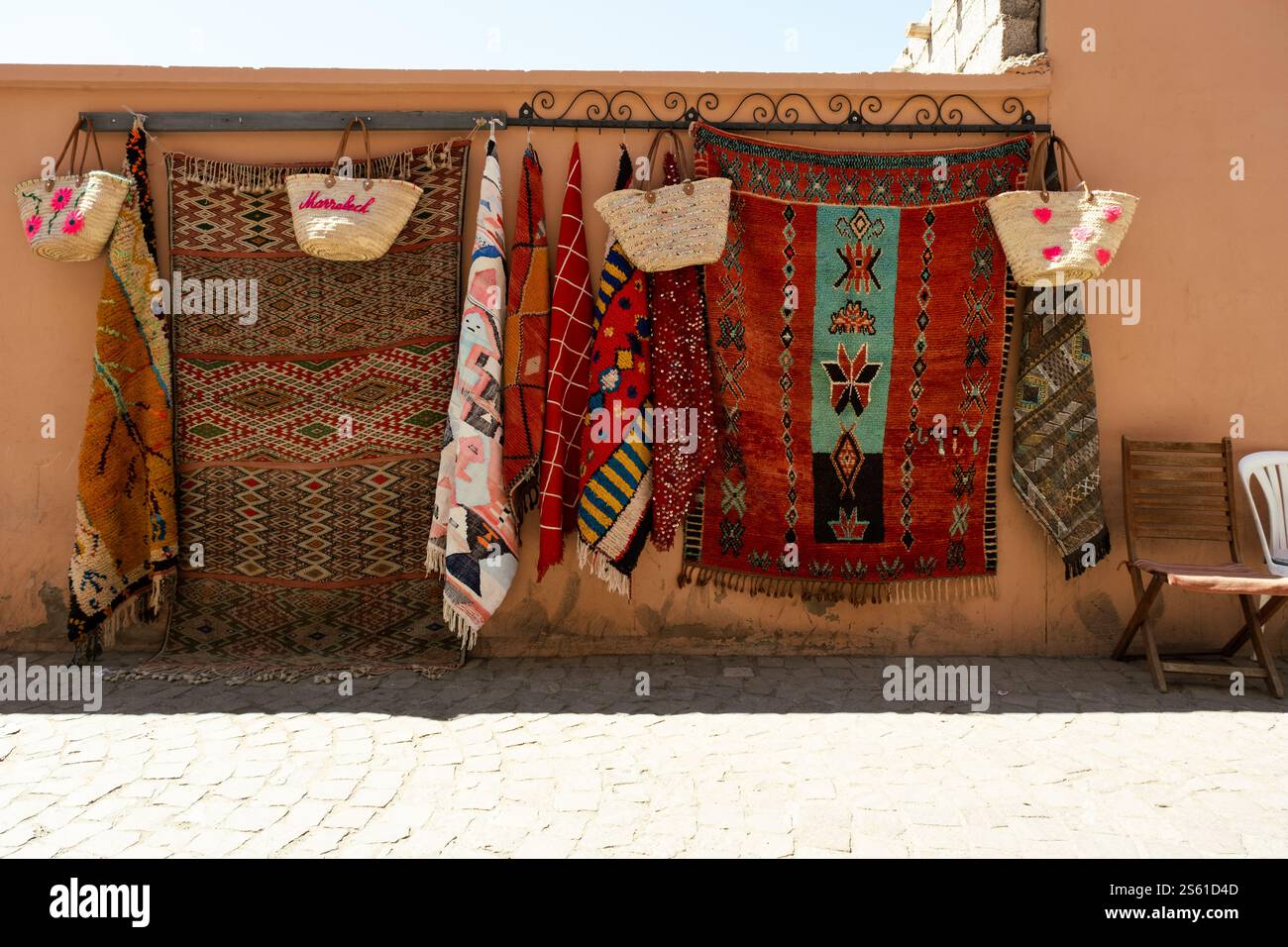 Traditional moroccan rugs and souvenirs in the walls of the Marrakech ...