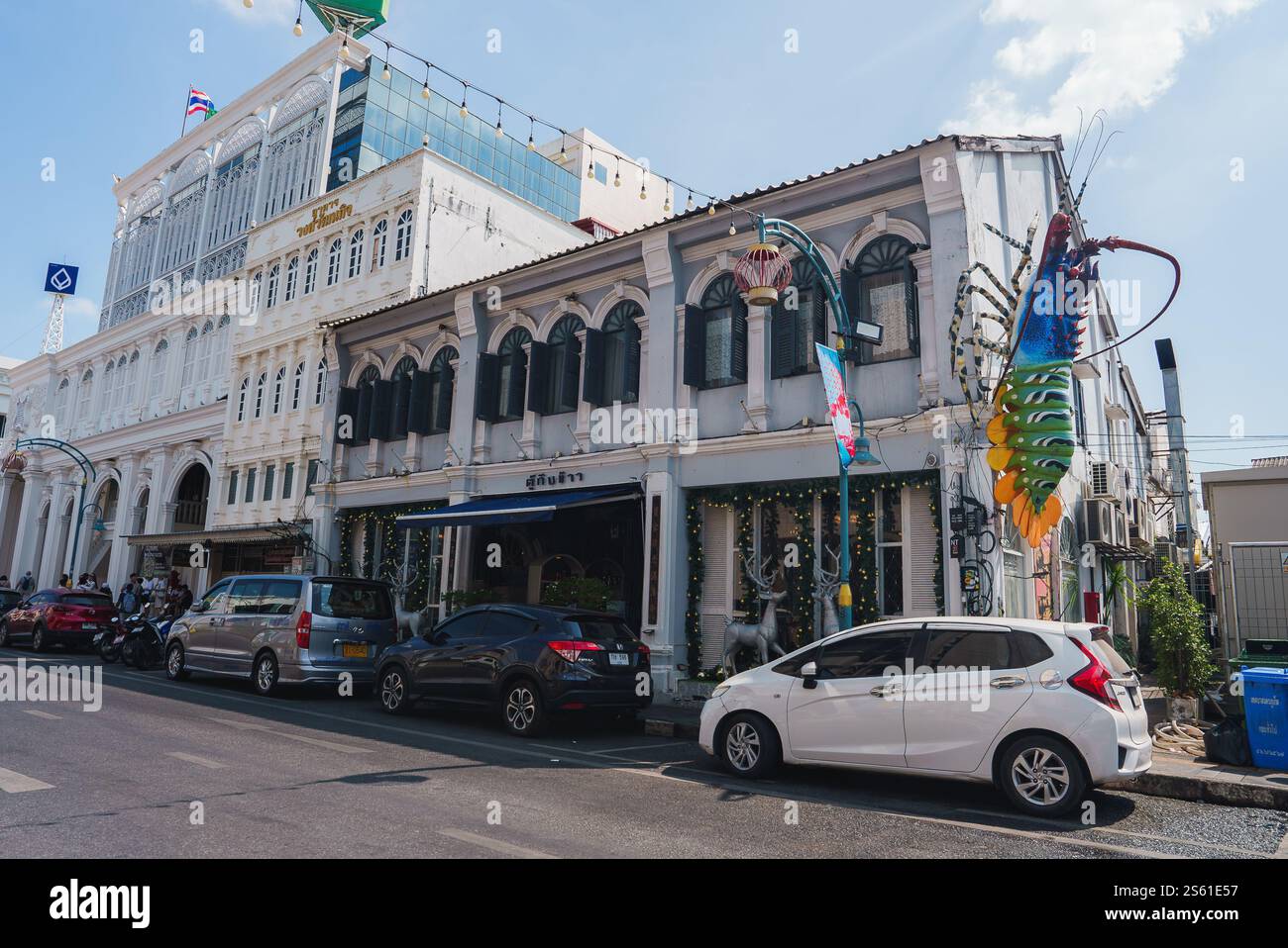 Colonial Style Street in Phuket, Thailand with Thai Flag and Sculpture ...