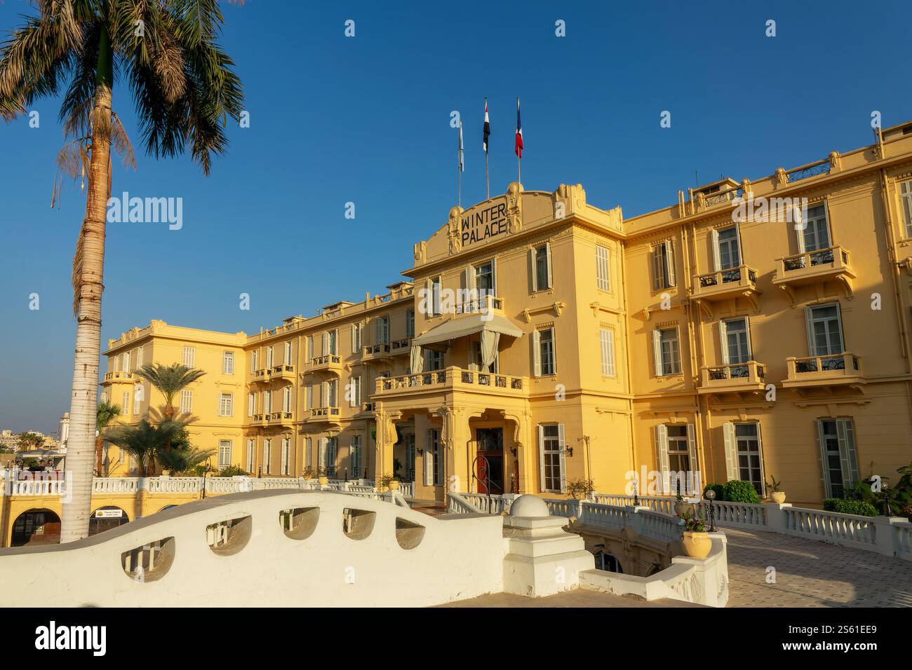 Famous old Winter Palace hotel, on the banks of the Nile river in Luxor ...