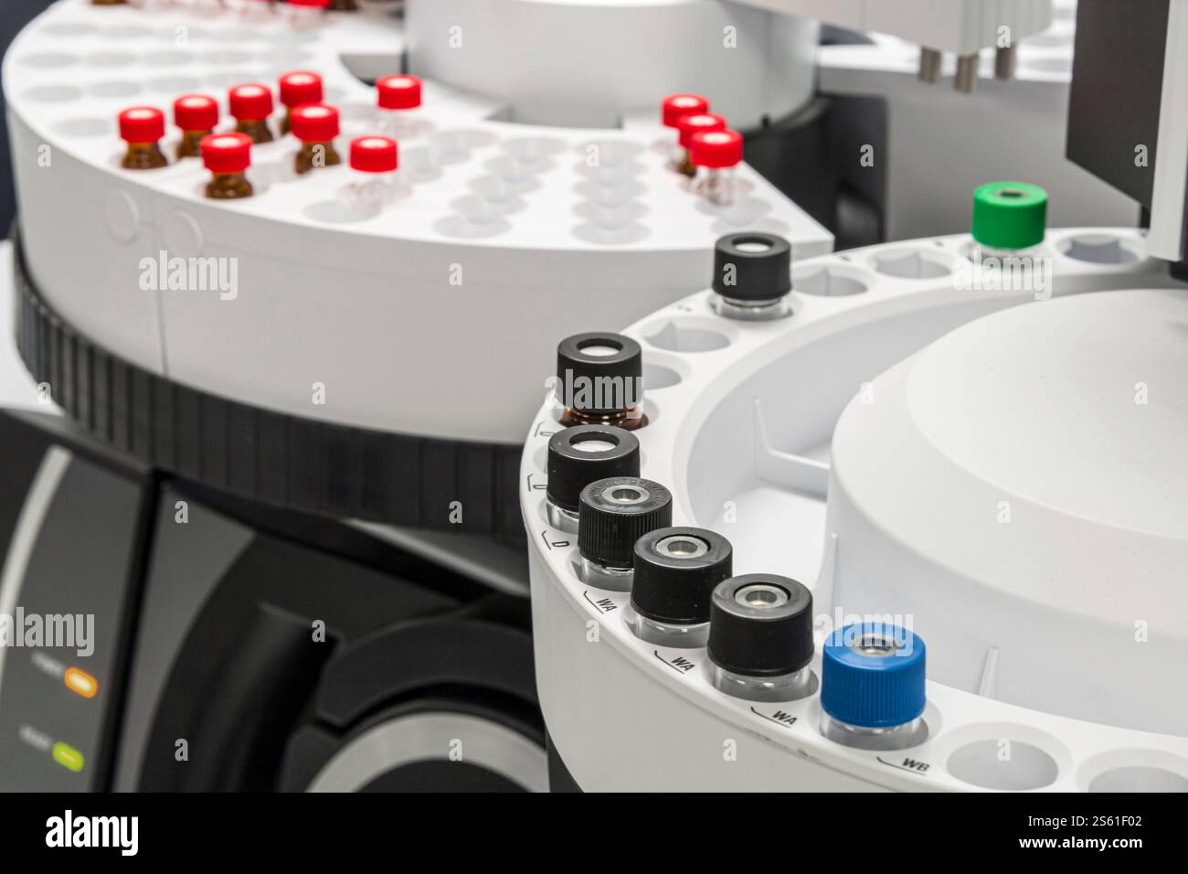 Vials in automated scientific testing equipment, USA Stock Photo - Alamy