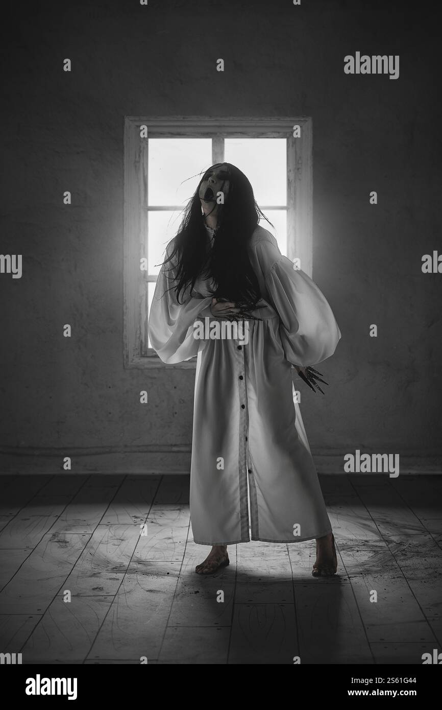 Terrifying woman in white flowing gown, long claws, with open mouth ...