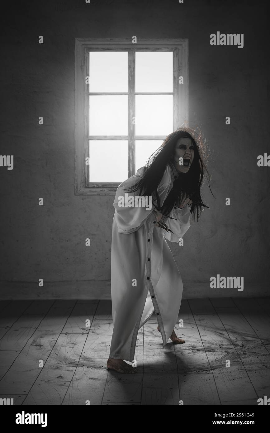 Inner fear and hysteria. A dynamic image of a creepy shouting woman ...