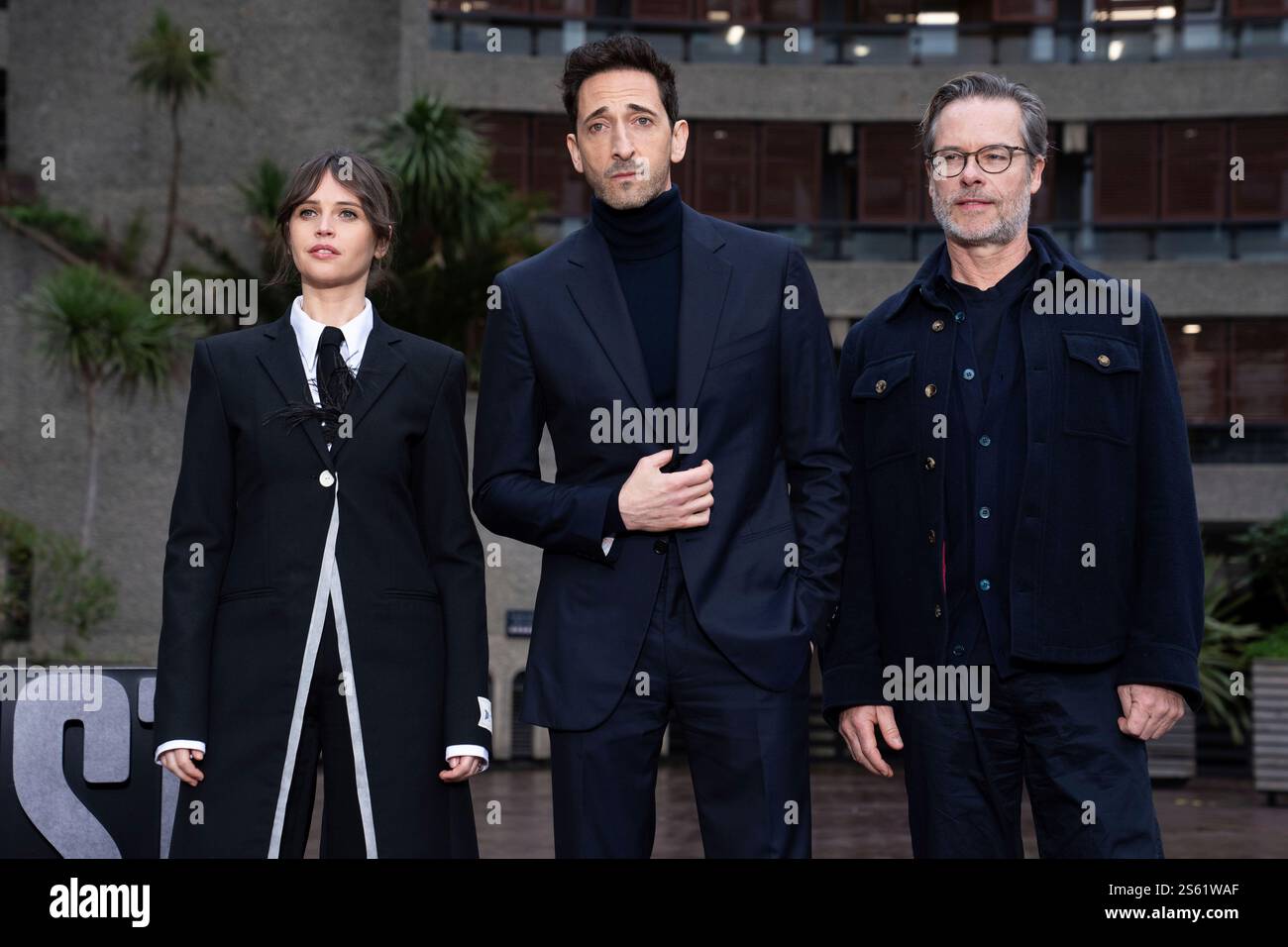 Felicity Jones, from left, Adrien Brody and Guy Pearce pose for photographers upon arrival at ...