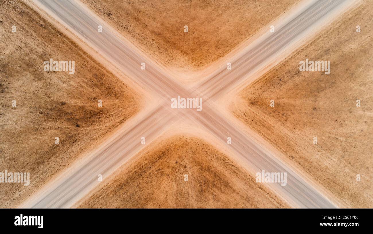 Aerial overhead view of intersecting roads and pathways creating ...