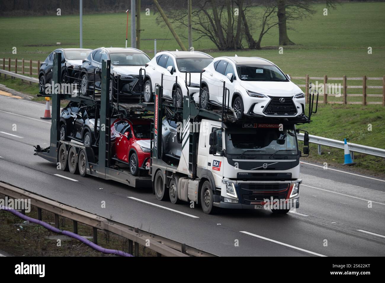 BCA Automotive transporter carrying new Lexus cars on the M42 motorway ...