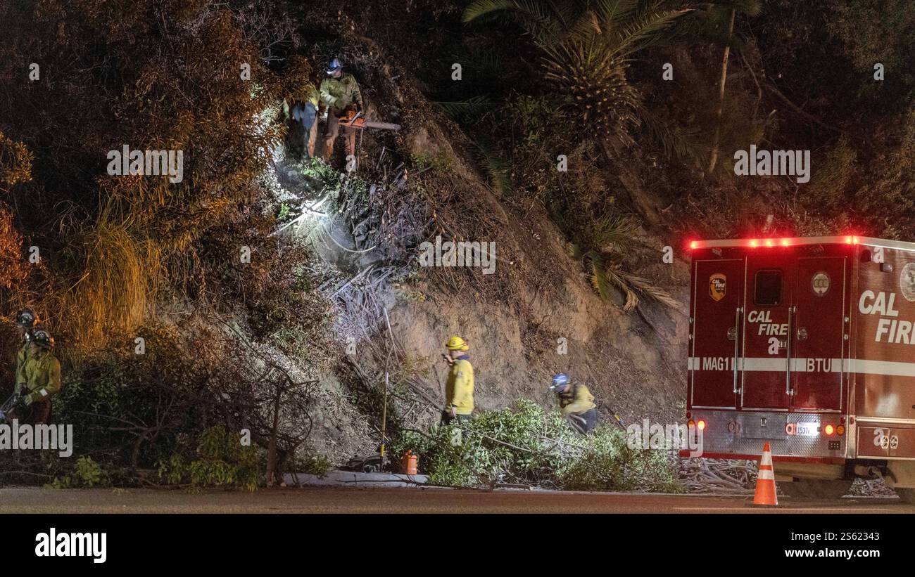 Pacific Palisades, California, USA. 15th Jan, 2025. Cal Fire crew work ...