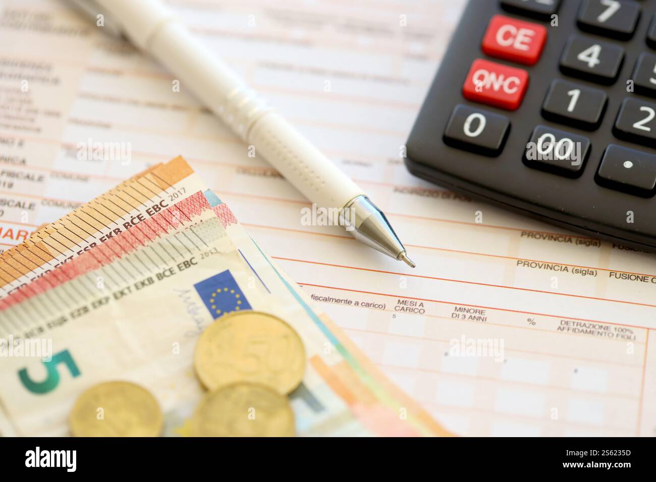 Filling italian tax form process with pen hi-res stock photography and ...