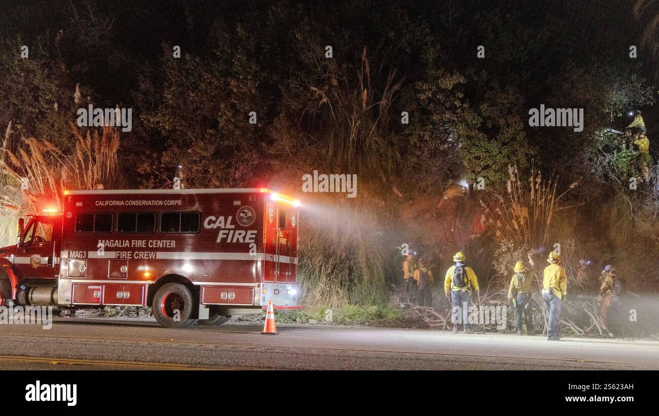 Pacific Palisades, California, USA. 15th Jan, 2025. Cal Fire crew work ...