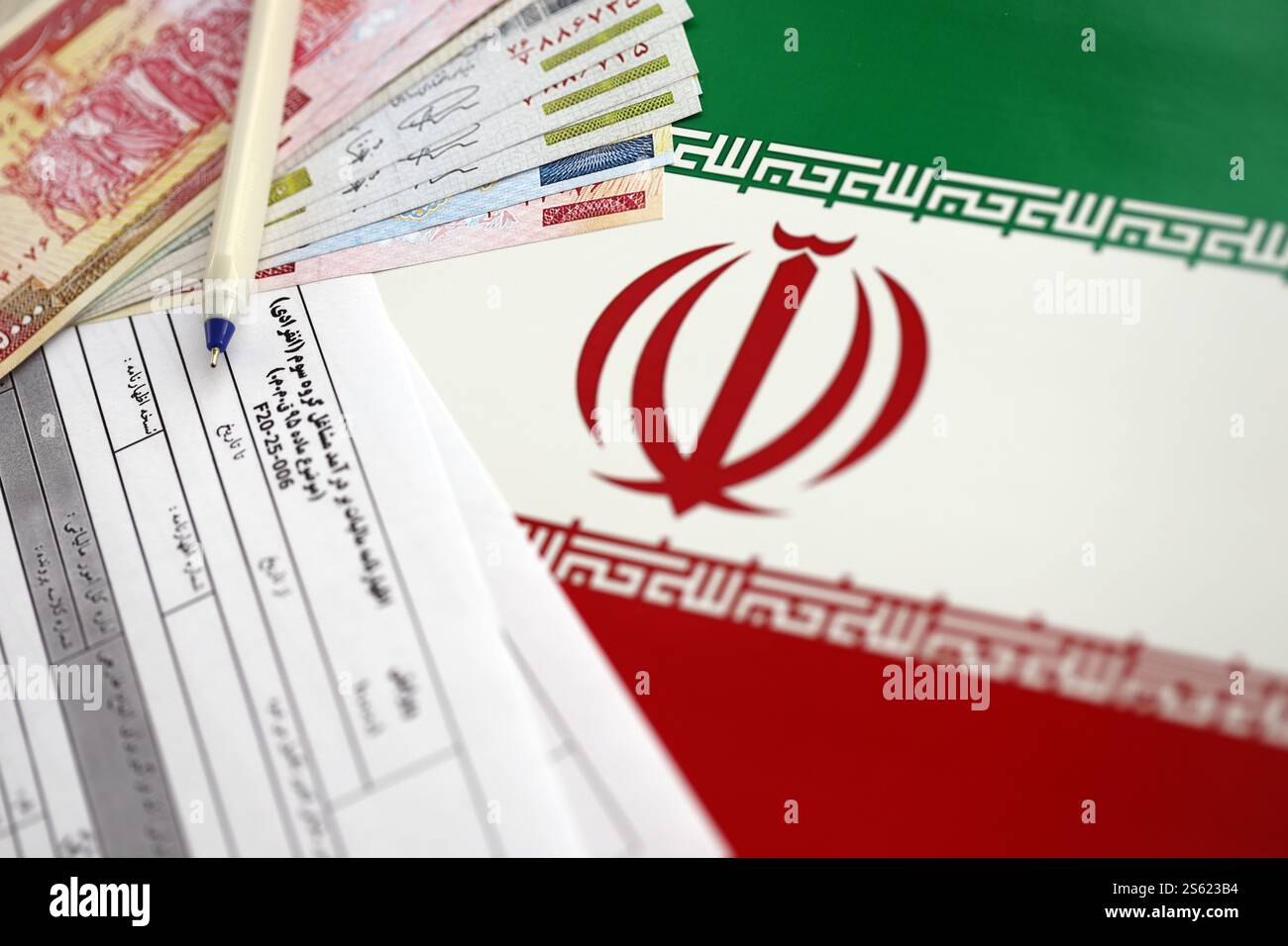 Iranian annual income tax return form F20-25-006 ready to fill on table ...