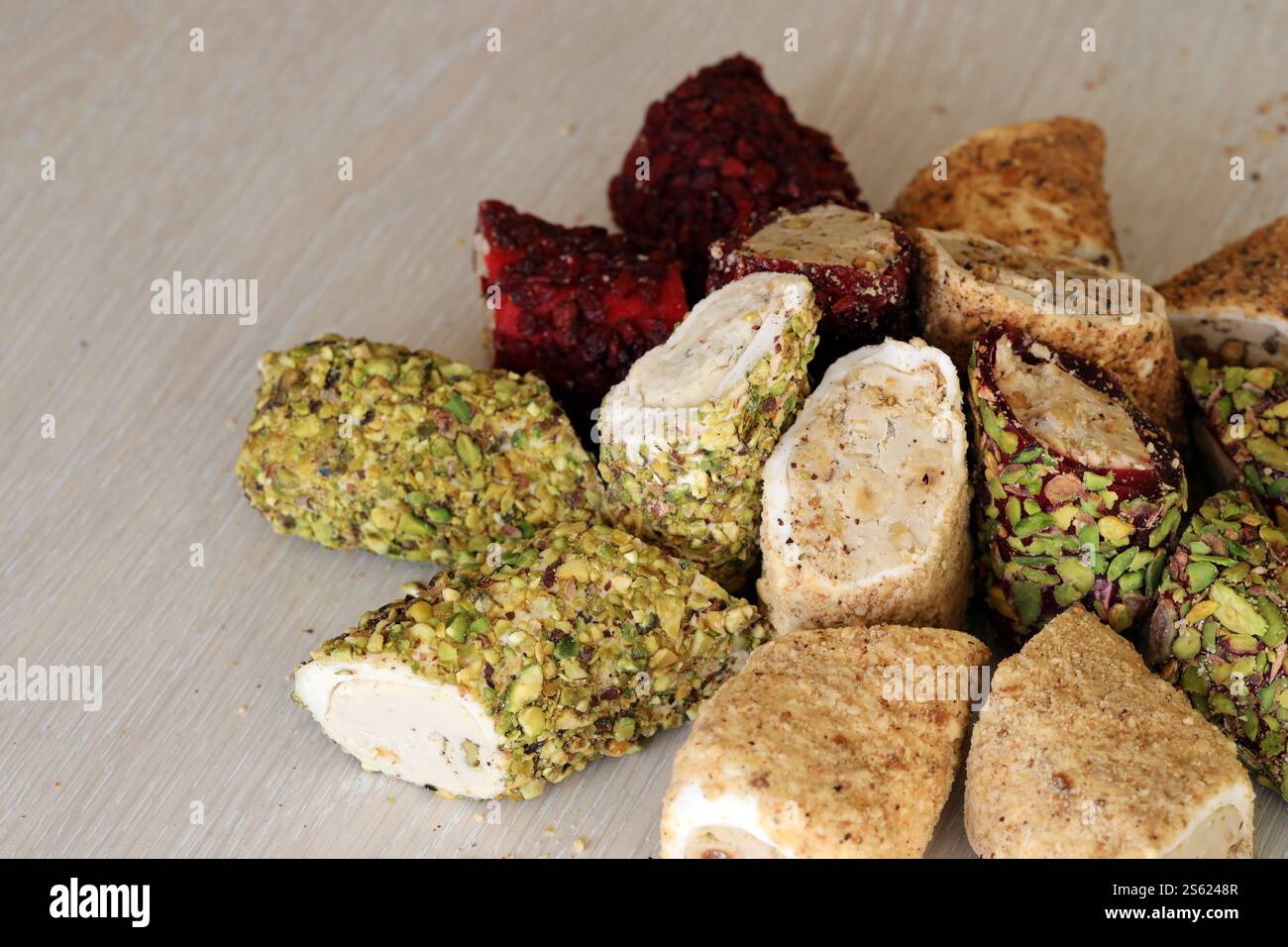 Rolls of turkish delight with different flavors and fillings close up ...