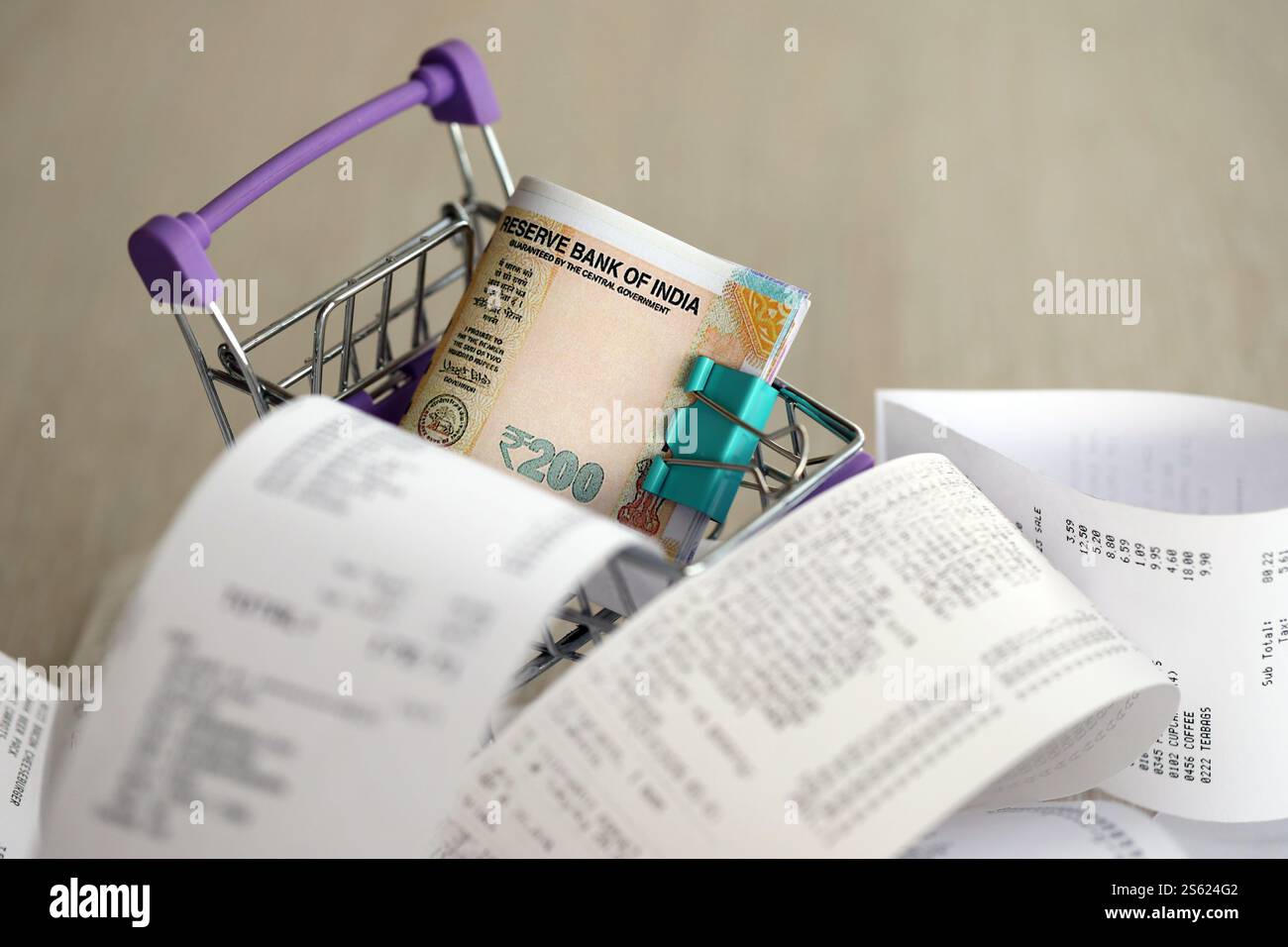Indian rupees money bills bunch in shopping trolley surrounded by many ...