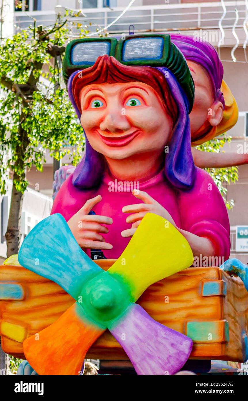 Giant Carnival Statue of a Funny Colorful Female Pilot on a Vehicle ...