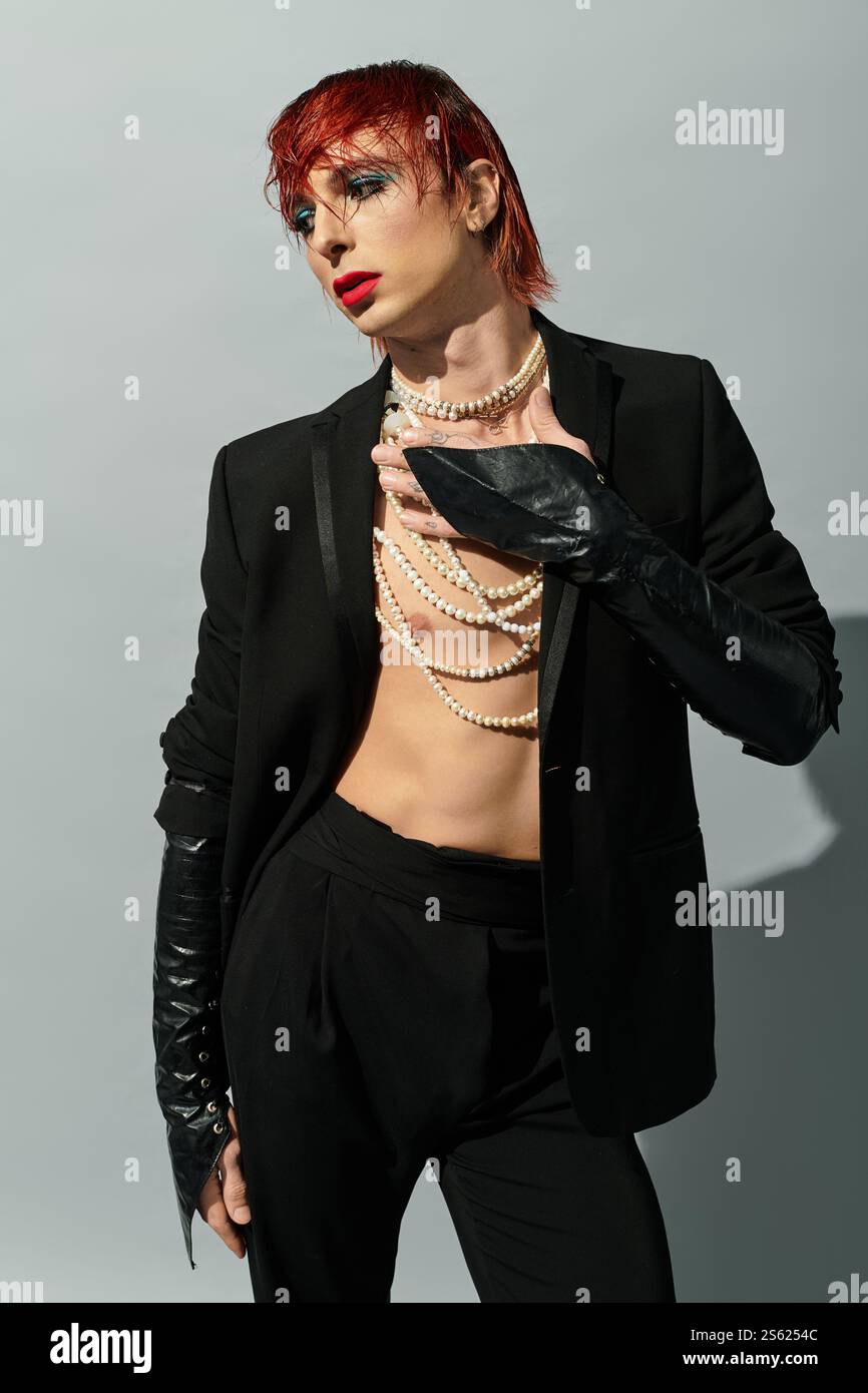 A bold young man showcases a striking fashion statement while ...