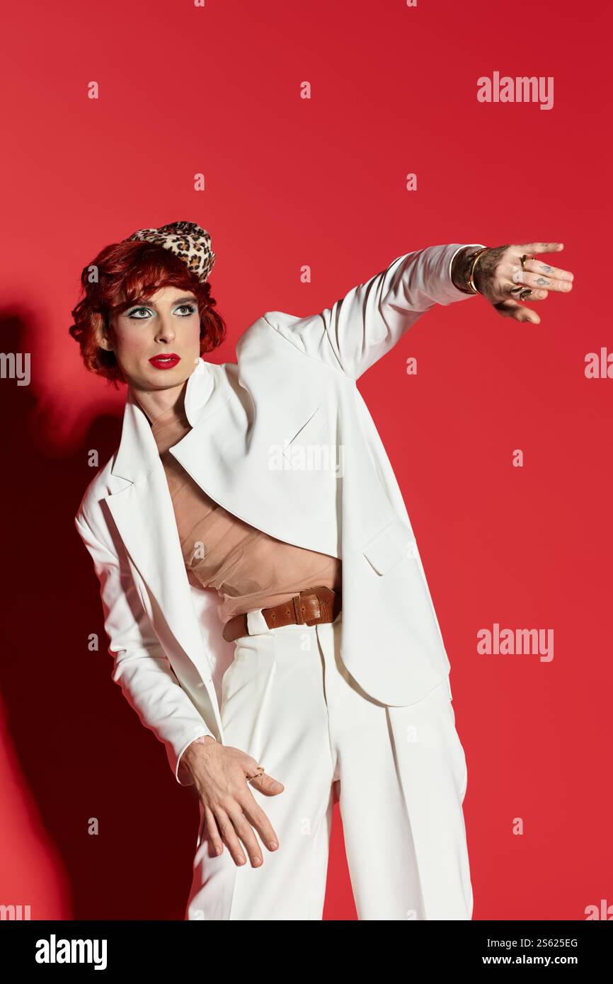 A young man confidently showcases his bold, stylish fashion in an ...