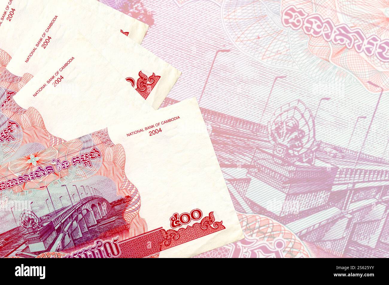 500 Cambodian riels bills lies in stack on background of big semi ...