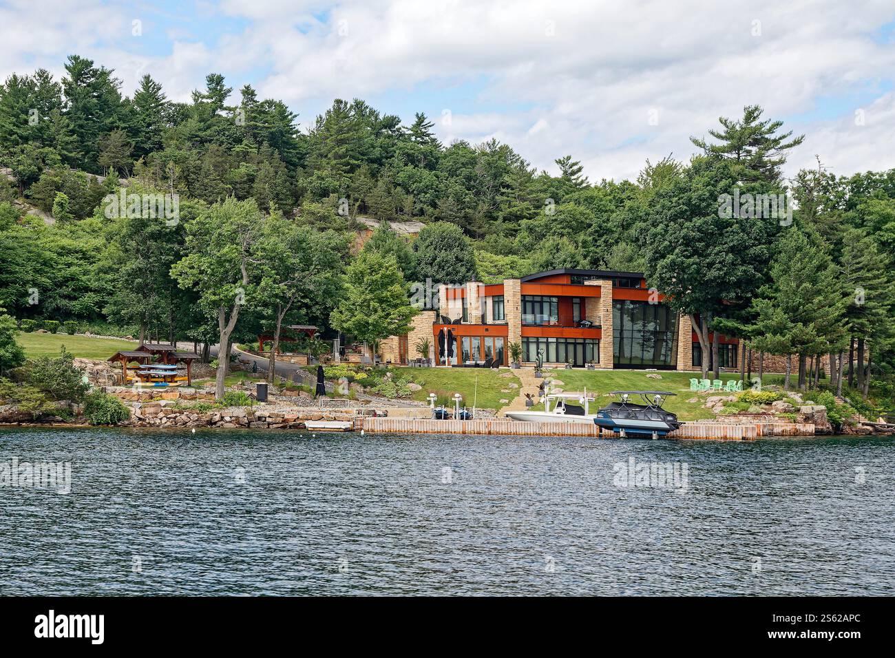 large house on water, vacation home, landscaped, modern design, dock, 2 ...