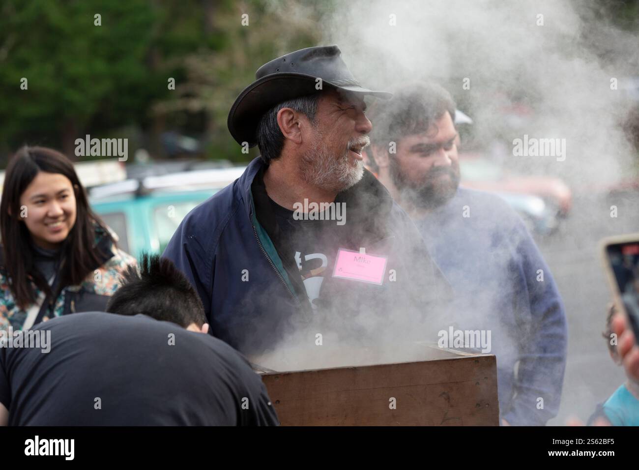 Mike Okano prepares steamed sweet rice for pounding at the Mochi Tsuki ...