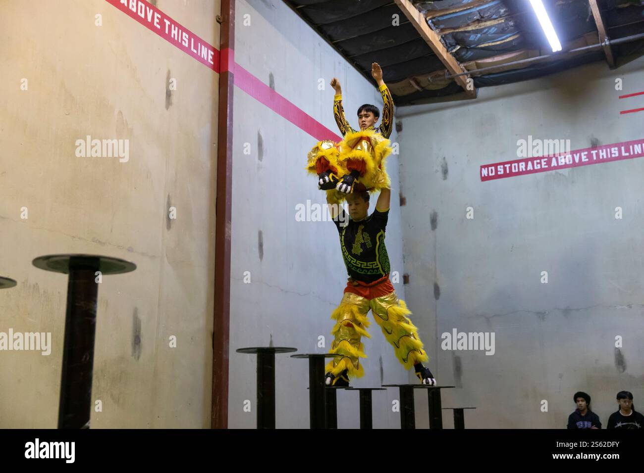 Johnny Nguyen (top) and Martin Lau with Mak Fai Lion Dance troupe ...