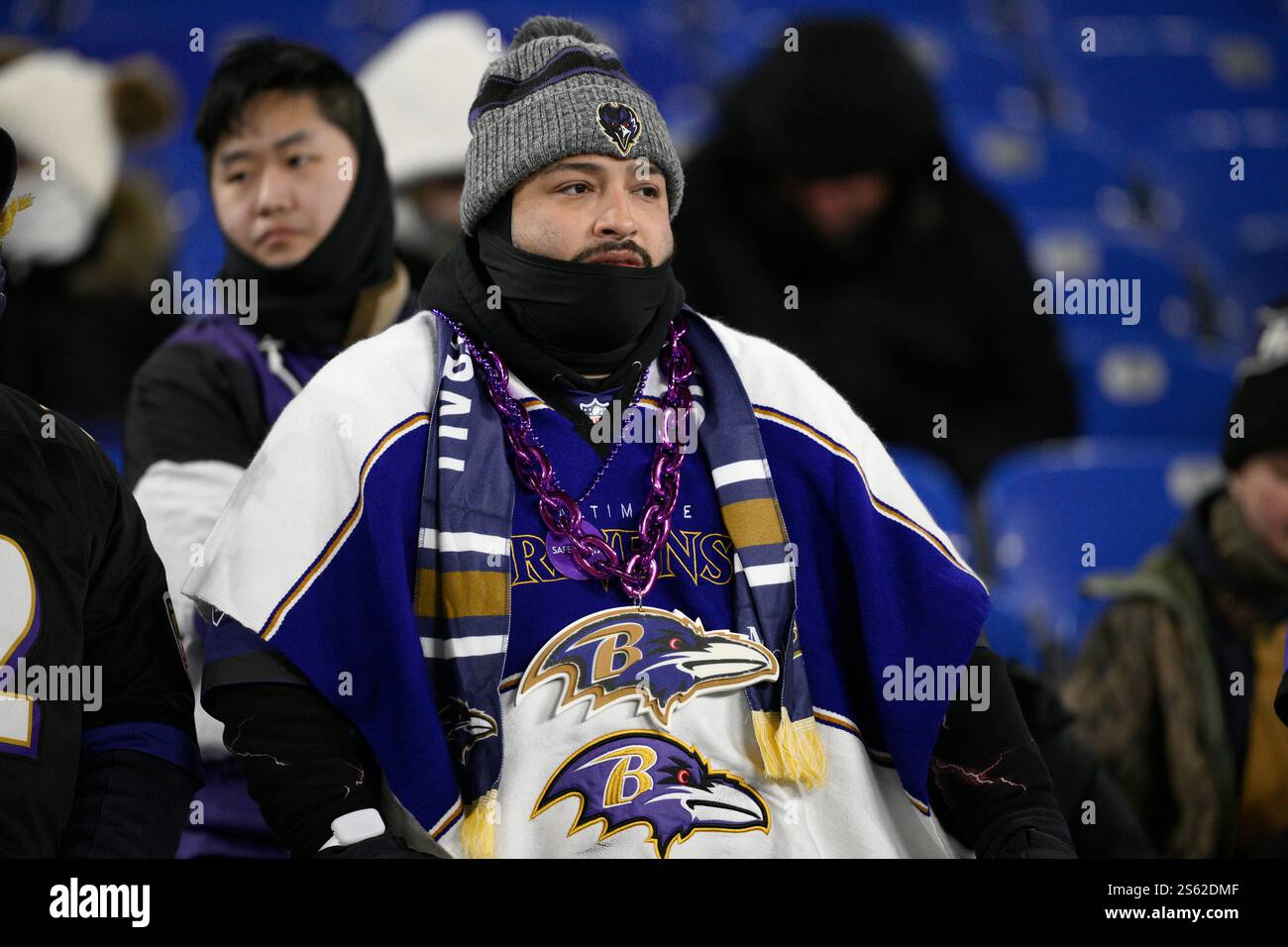 A spectator looks on before an NFL football wild card playoff game ...