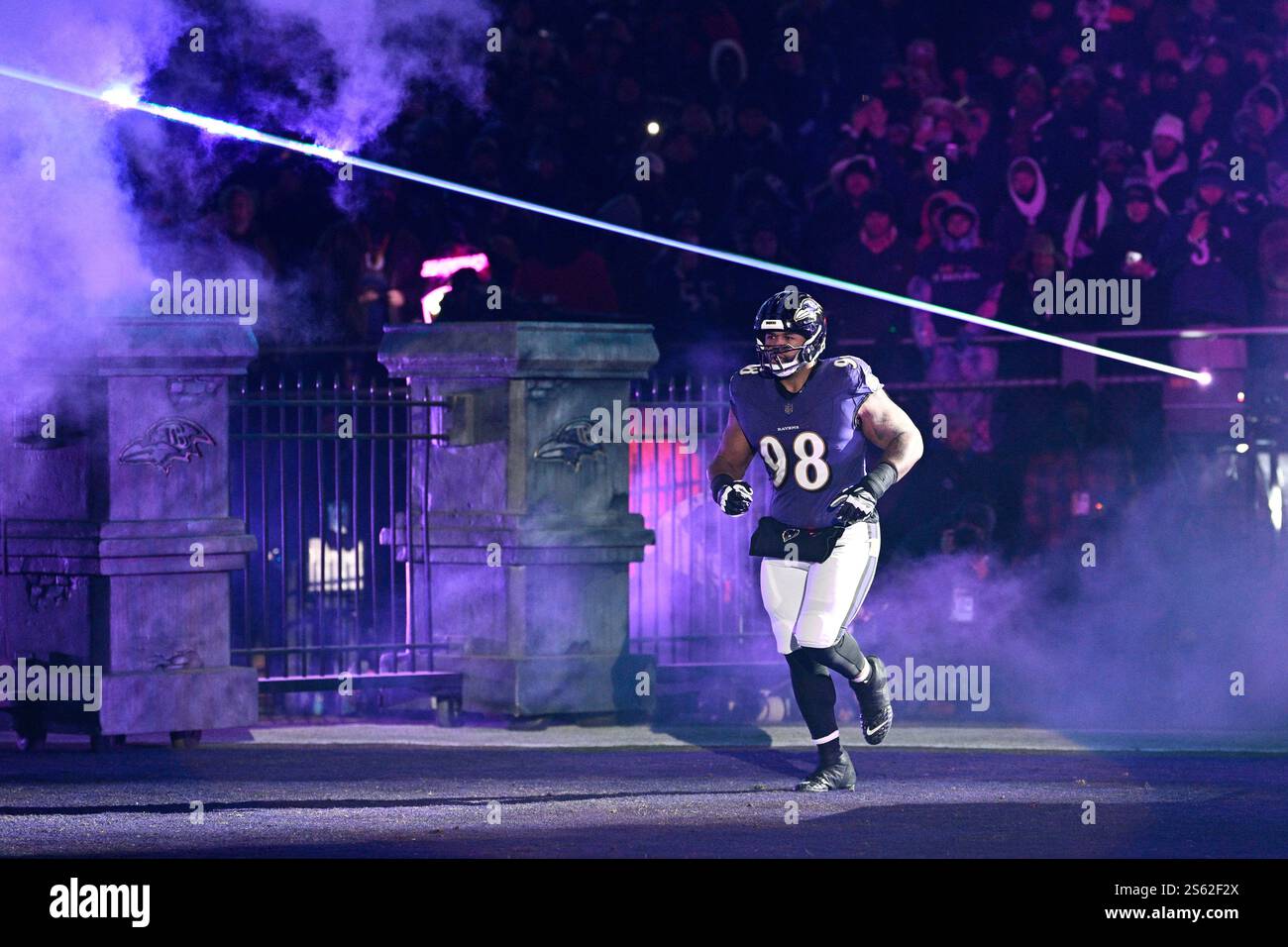 Baltimore Ravens defensive tackle Travis Jones (98) takes to the field ...