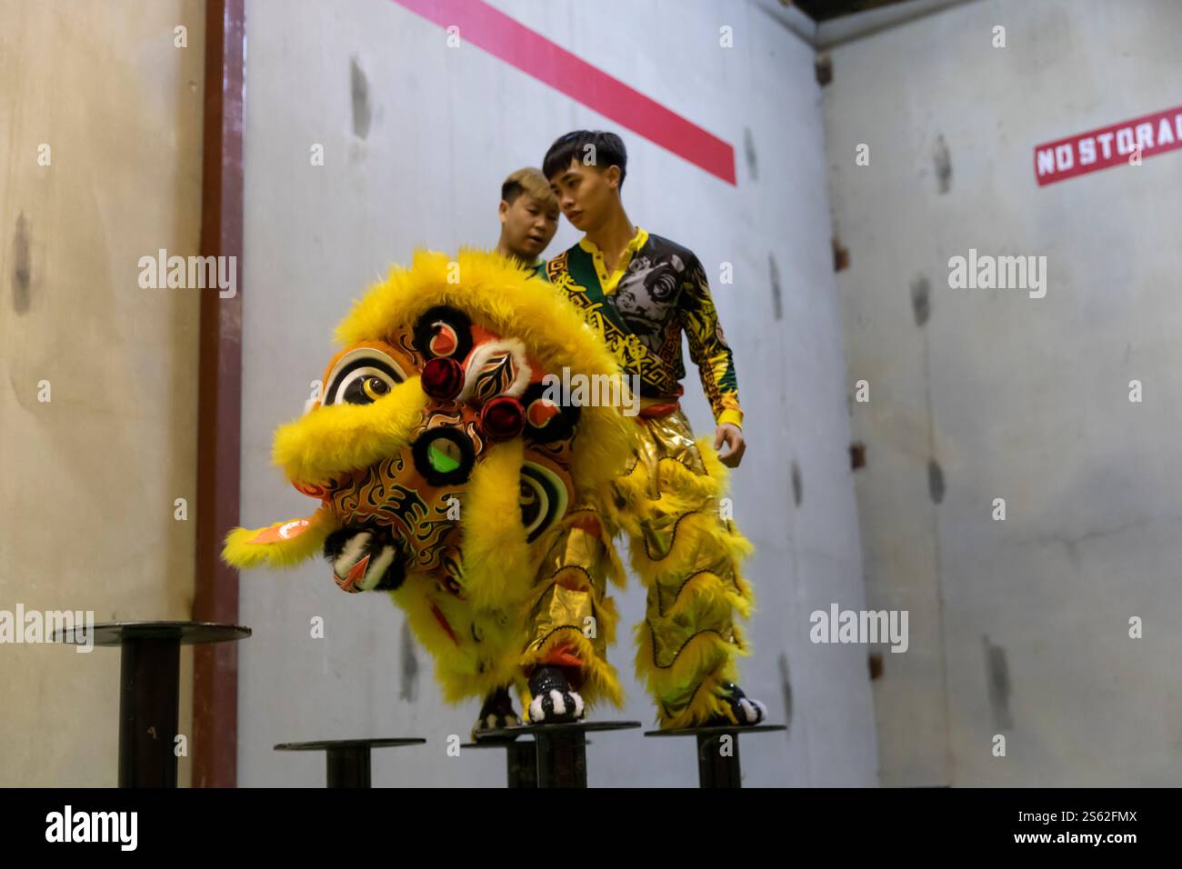 Johnny Nguyen (right) and Martin Lau with Mak Fai Lion Dance troupe ...