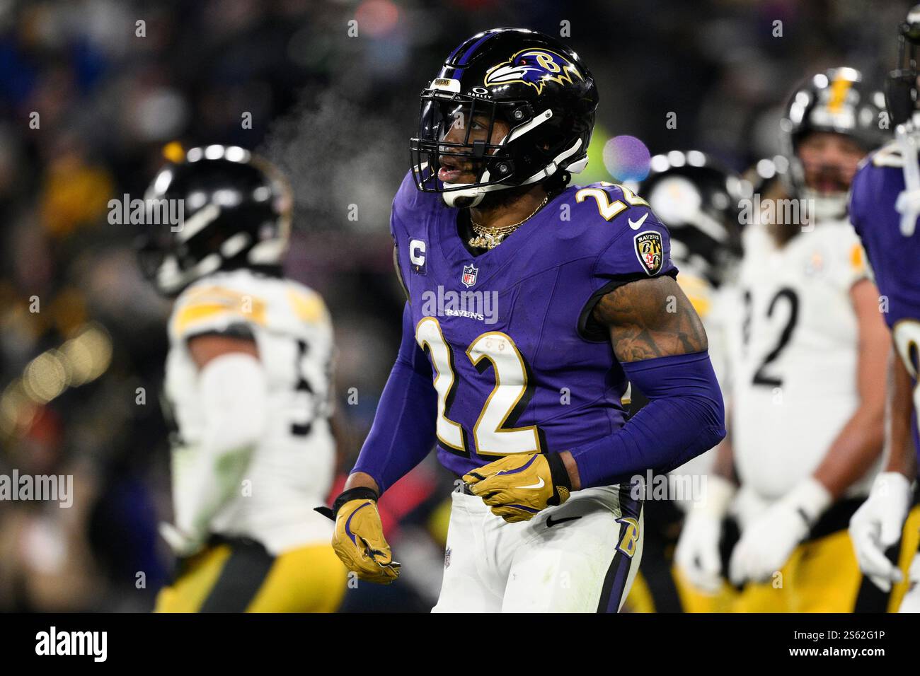 Baltimore Ravens running back Derrick Henry (22) looks on during the ...