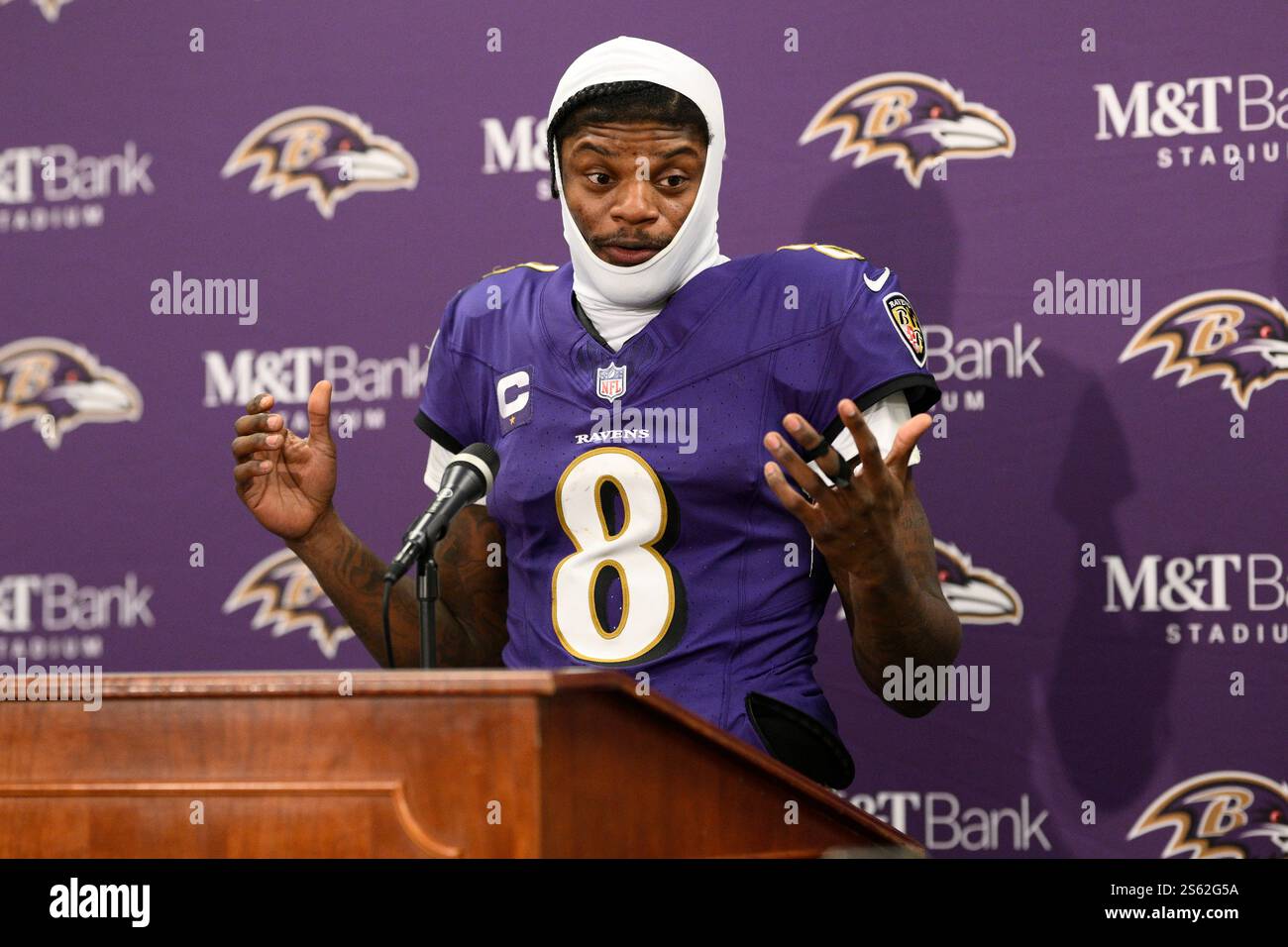Baltimore Ravens quarterback Lamar Jackson talks to reporters following ...