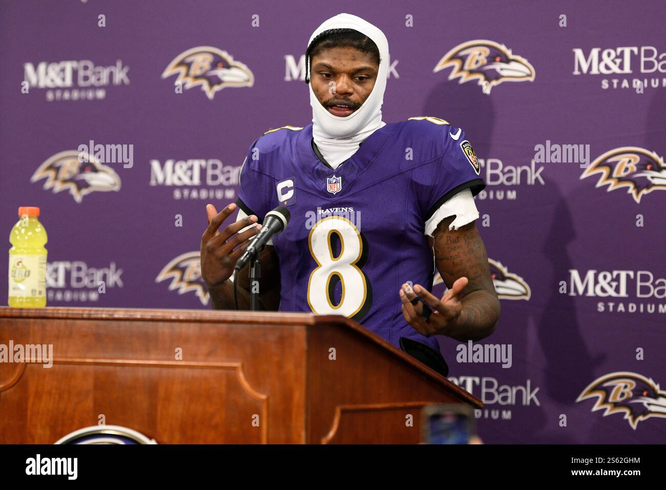 Baltimore Ravens quarterback Lamar Jackson talks to reporters following ...