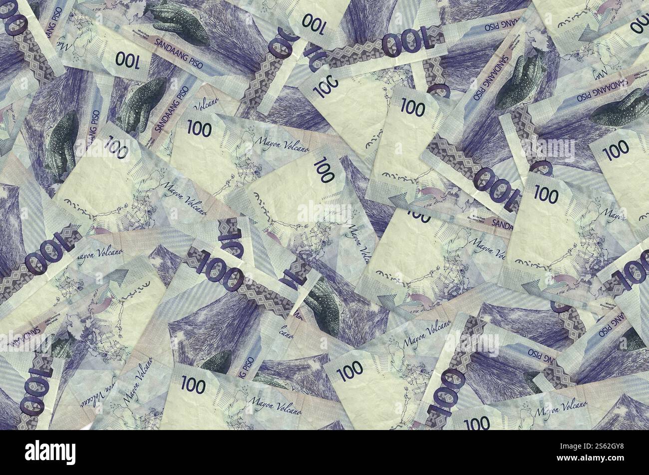 100 Philippine piso bills lies in big pile. Rich life conceptual ...