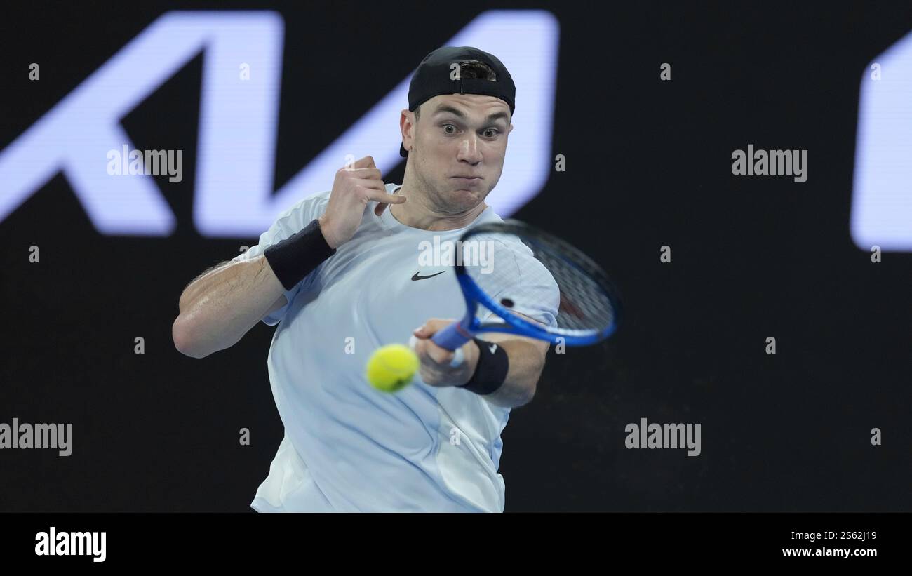 Jack Draper of Britain plays a forehand return to Thanasi Kokkinakis of ...