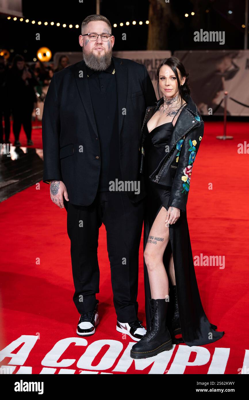 Rag'n'Bone Man, left, and Zoe Beardsall pose for photographers upon ...