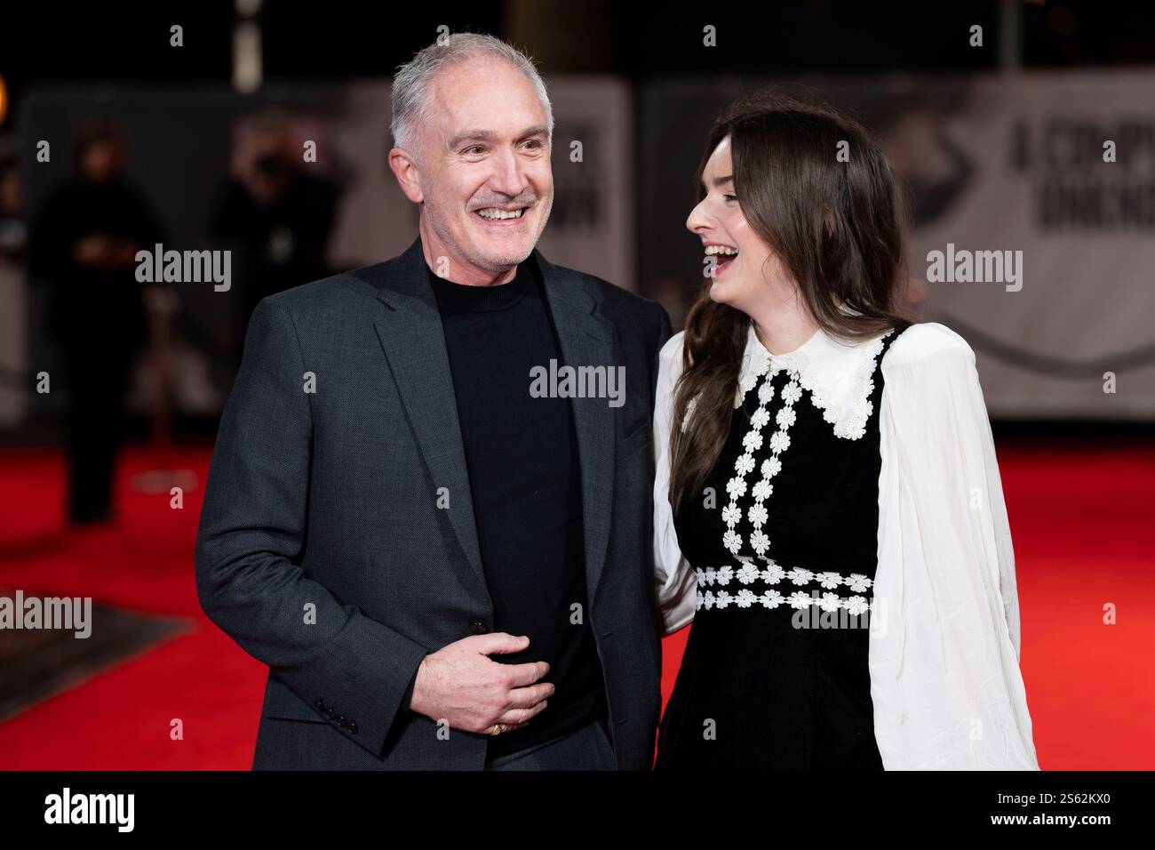 Tony Ferrino, left, and Liv Purvis pose for photographers upon arrival ...