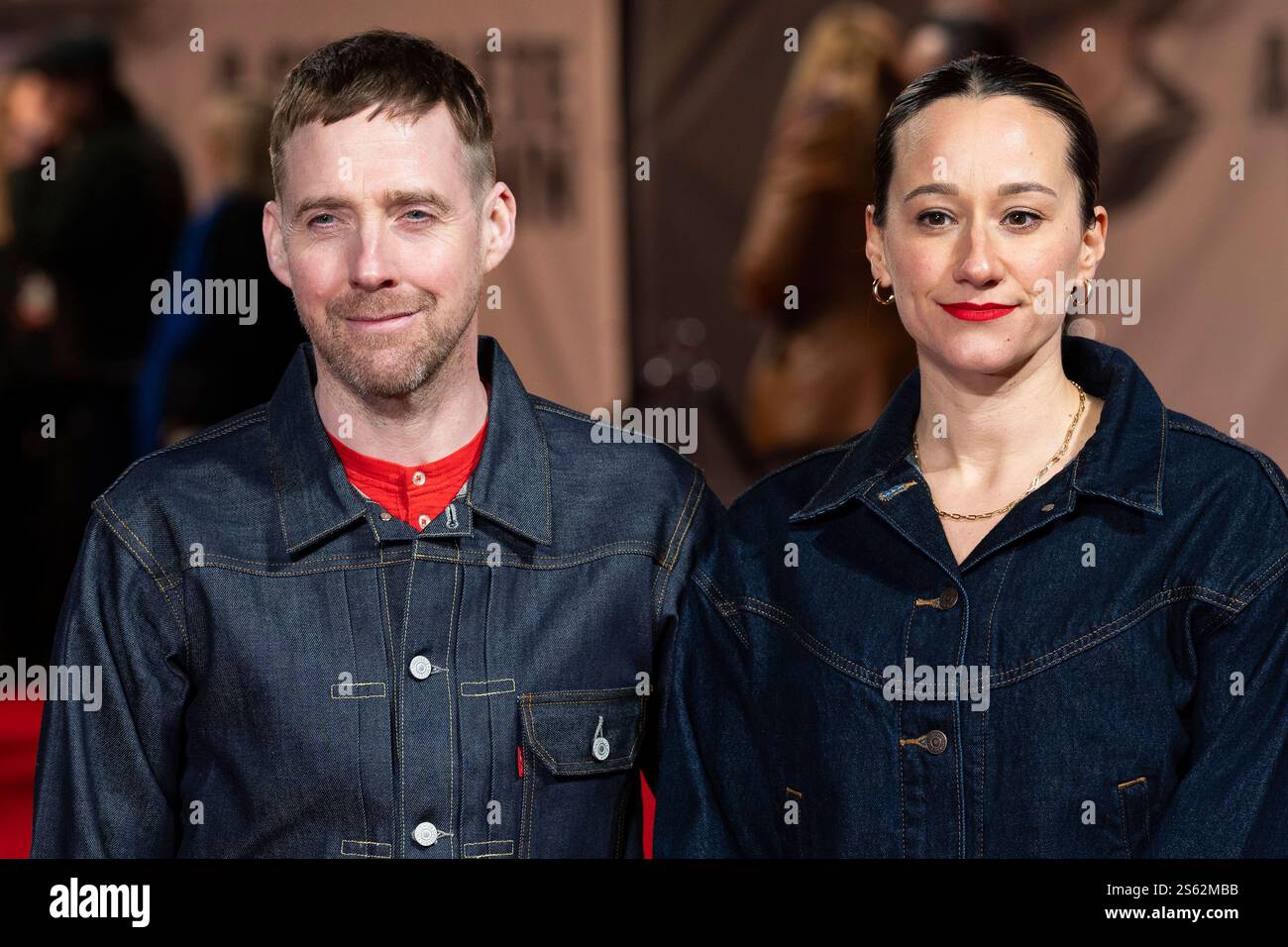 Ricky Wilson, left, and Grace Zito pose for photographers upon arrival ...